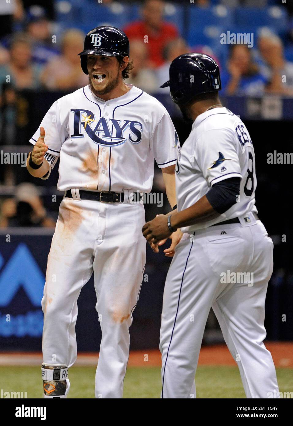 Tampa Bay Rays' Rickie Weeks Jr. (8) and Colby Rasmus, left, celebrate ...