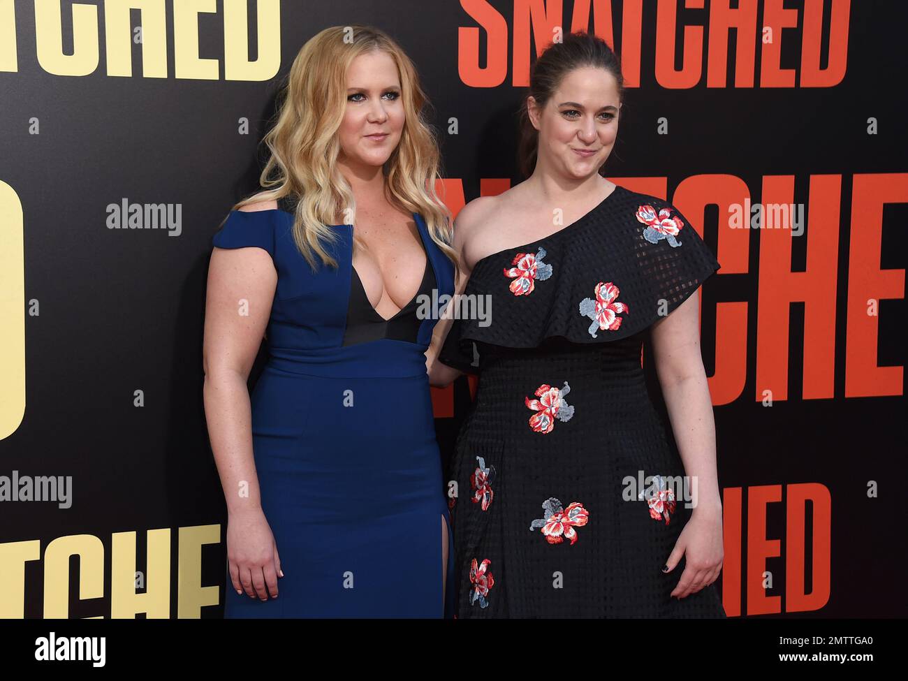 Amy Schumer, left, and Kim Caramele arrive at the Los Angeles premiere ...