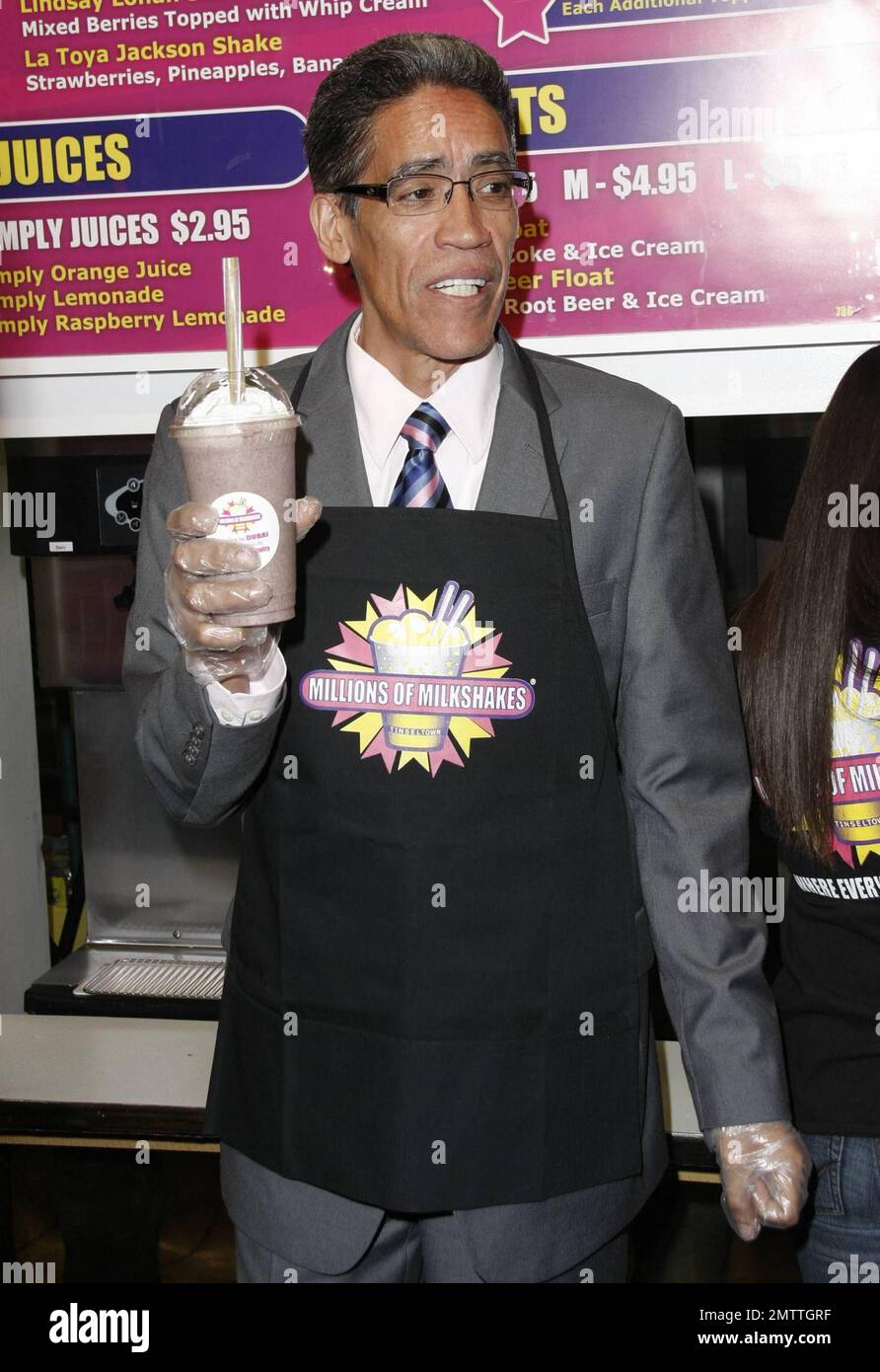 Looking sharp in a nice grey suit Ted Williams (aka the homeless man ...