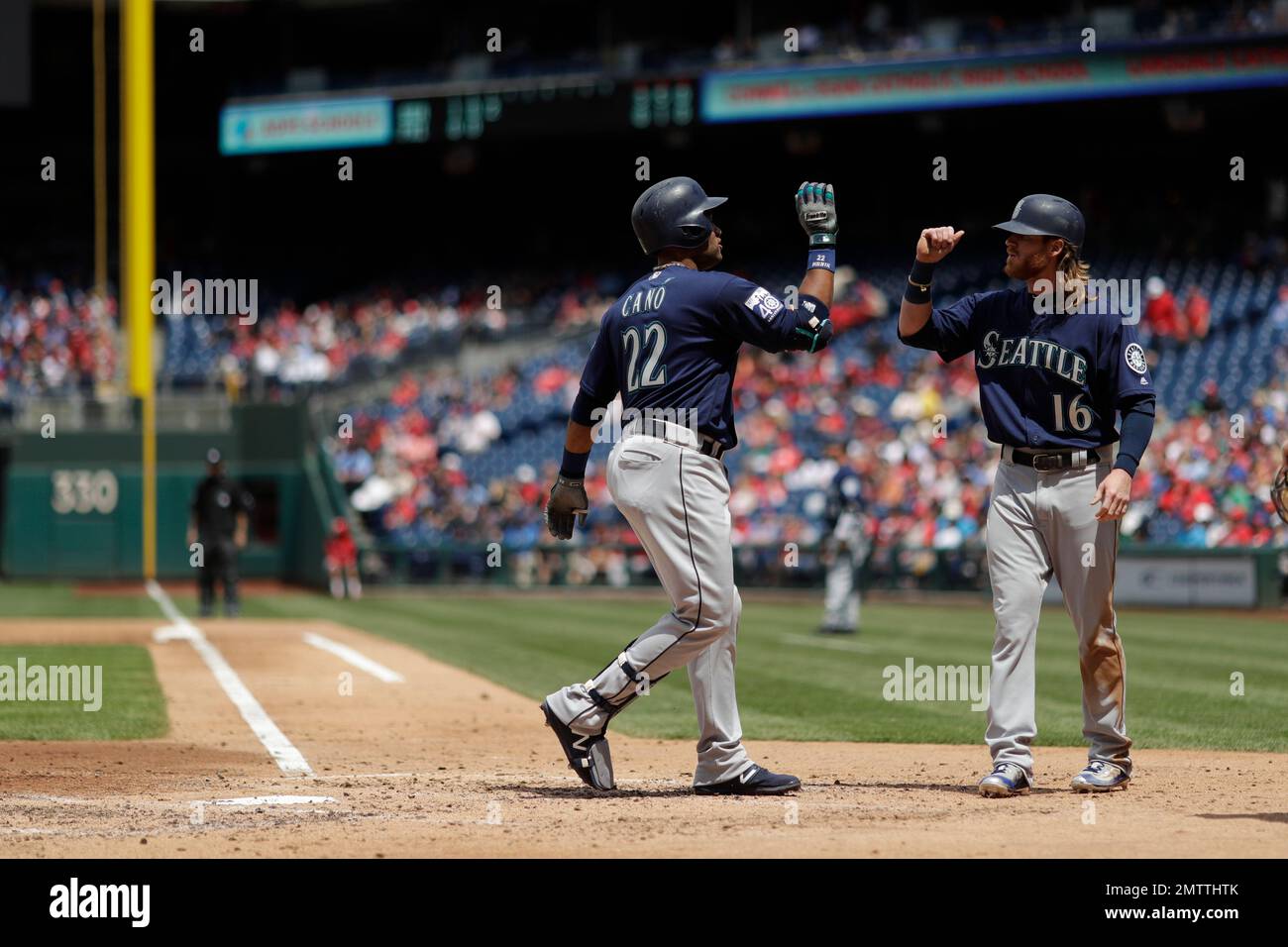 Seattle Mariners' Robinson Cano, celebrates with Ben Gamel during a ...