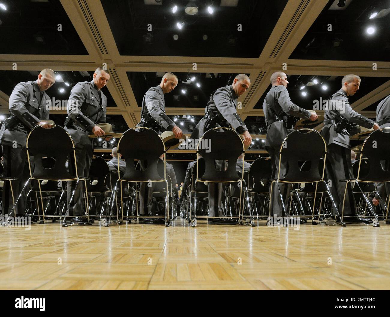 New York State Troppers place their stetson hats on chairs during a New ...