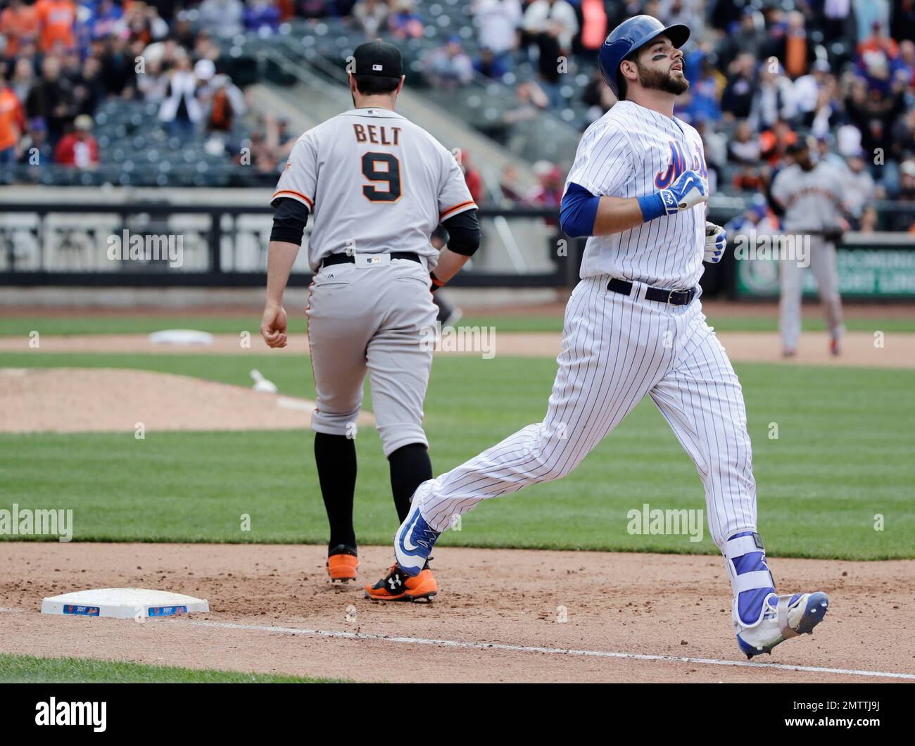 New York Mets' Kevin Plawecki (26) reacts after being thrown out at ...