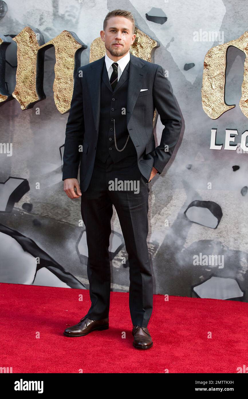 Actor Charlie Hunnam poses for photographers on arrival at the premiere ...