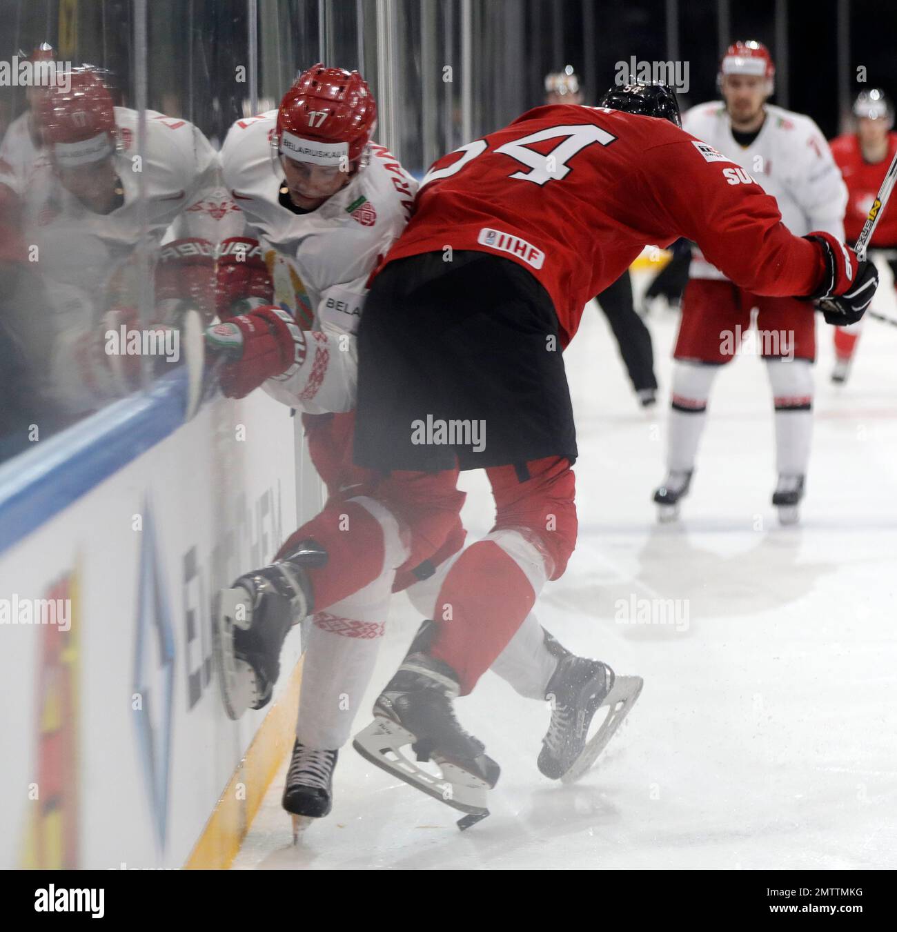 Switzerland's Philippe Furrer, right, checks Belarus' Yegor ...