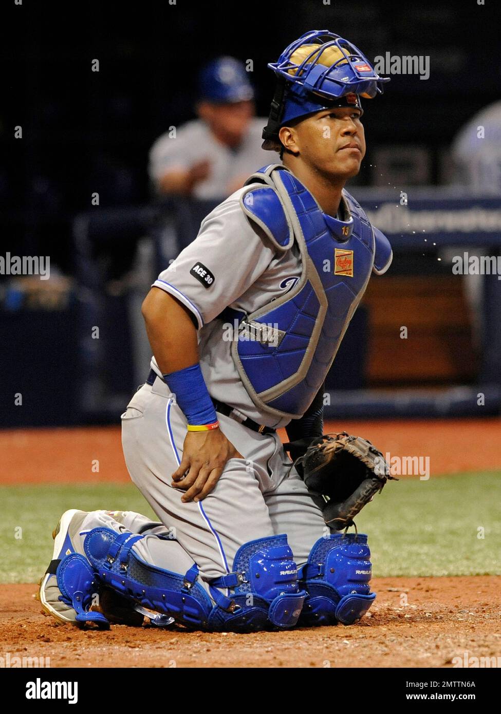 Kansas City Royals catcher Salvador Perez pauses between pitches during ...