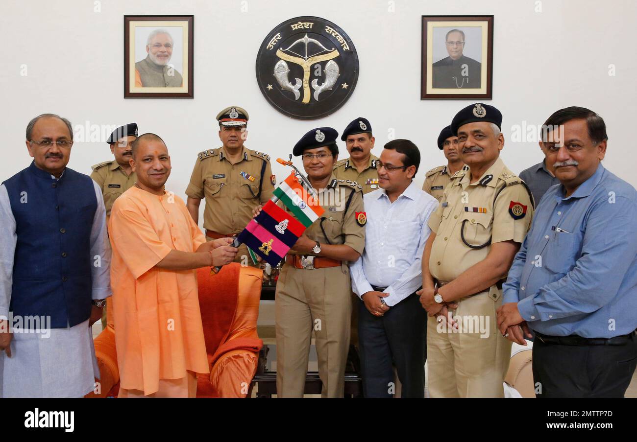 Uttar Pradesh state Chief Minister Yogi Adityanath presents the Indian ...