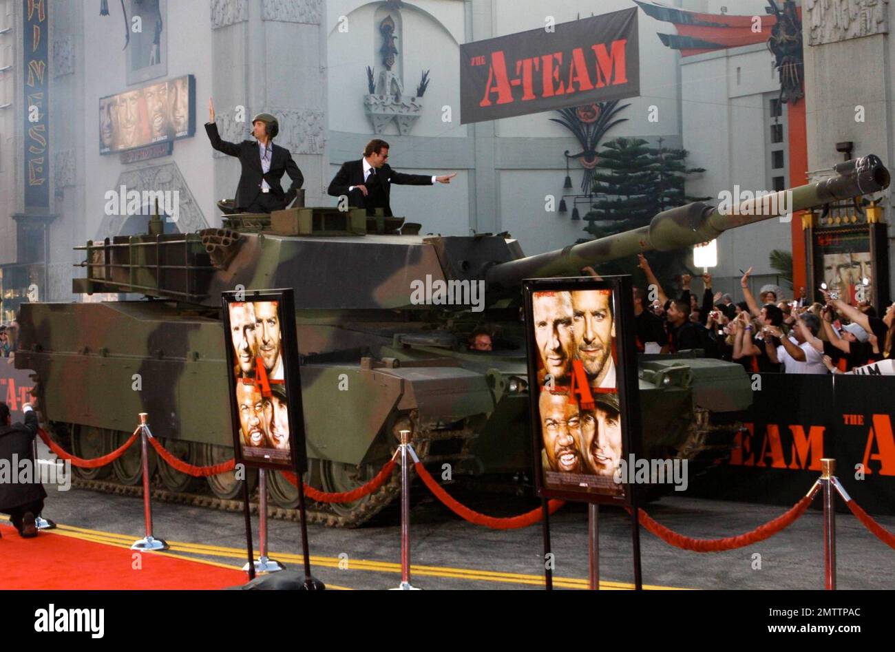 Bradley Cooper and Sharlto Copley arrive on a tank to the premiere of ...