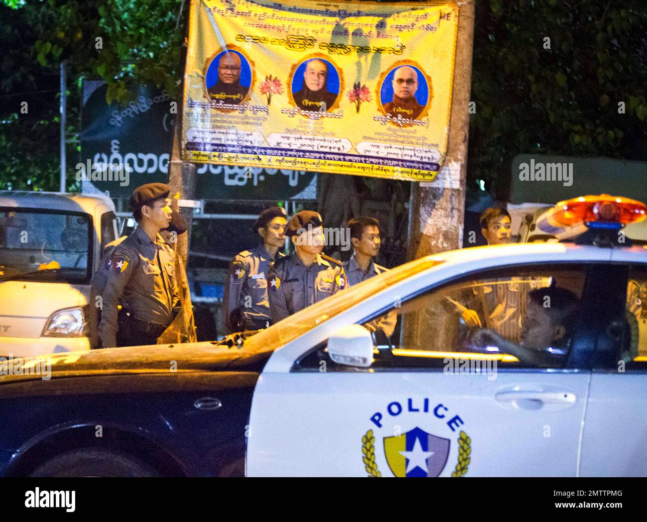 In this Tuesday, May 9, 2017 photo, Myanmar police officers stand to ...