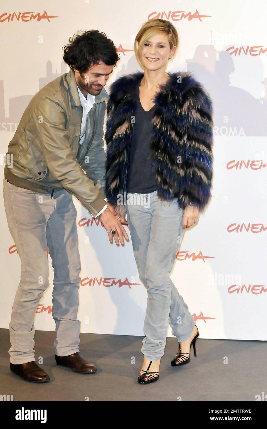 Actor Romain Duris has fun with actress Marina Fois poses at the photo ...