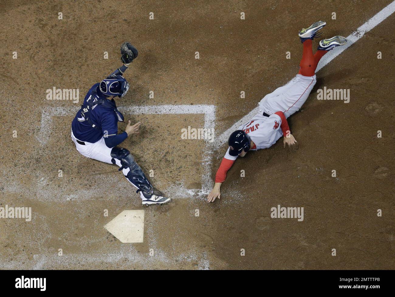 Boston Red Sox's Chase d'Arnaud slides safely past Milwaukee Brewers ...