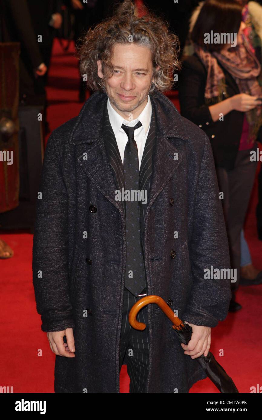 Dexter Fletcher poses for photographers on the red carpet at the UK ...