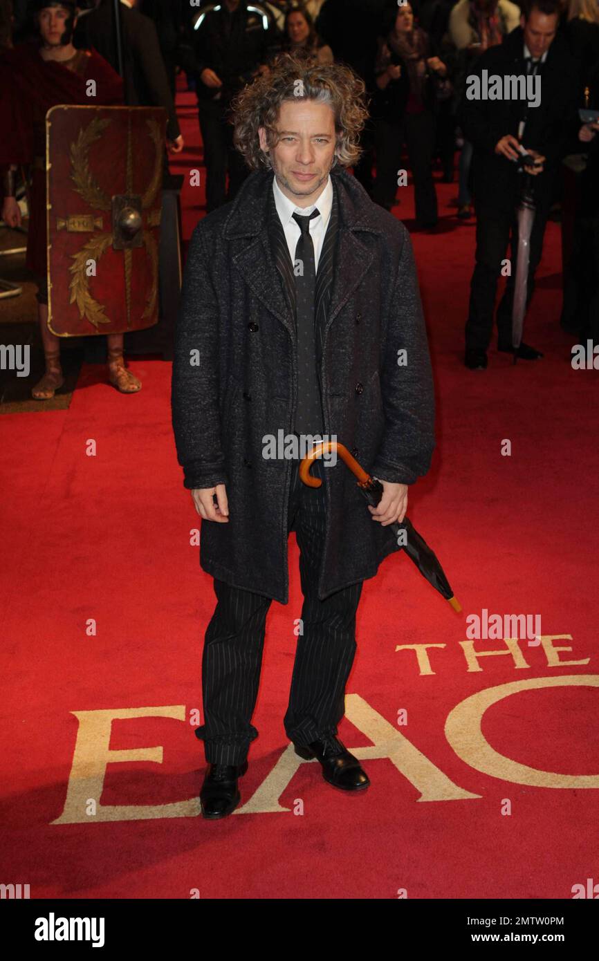 Dexter Fletcher poses for photographers on the red carpet at the UK ...