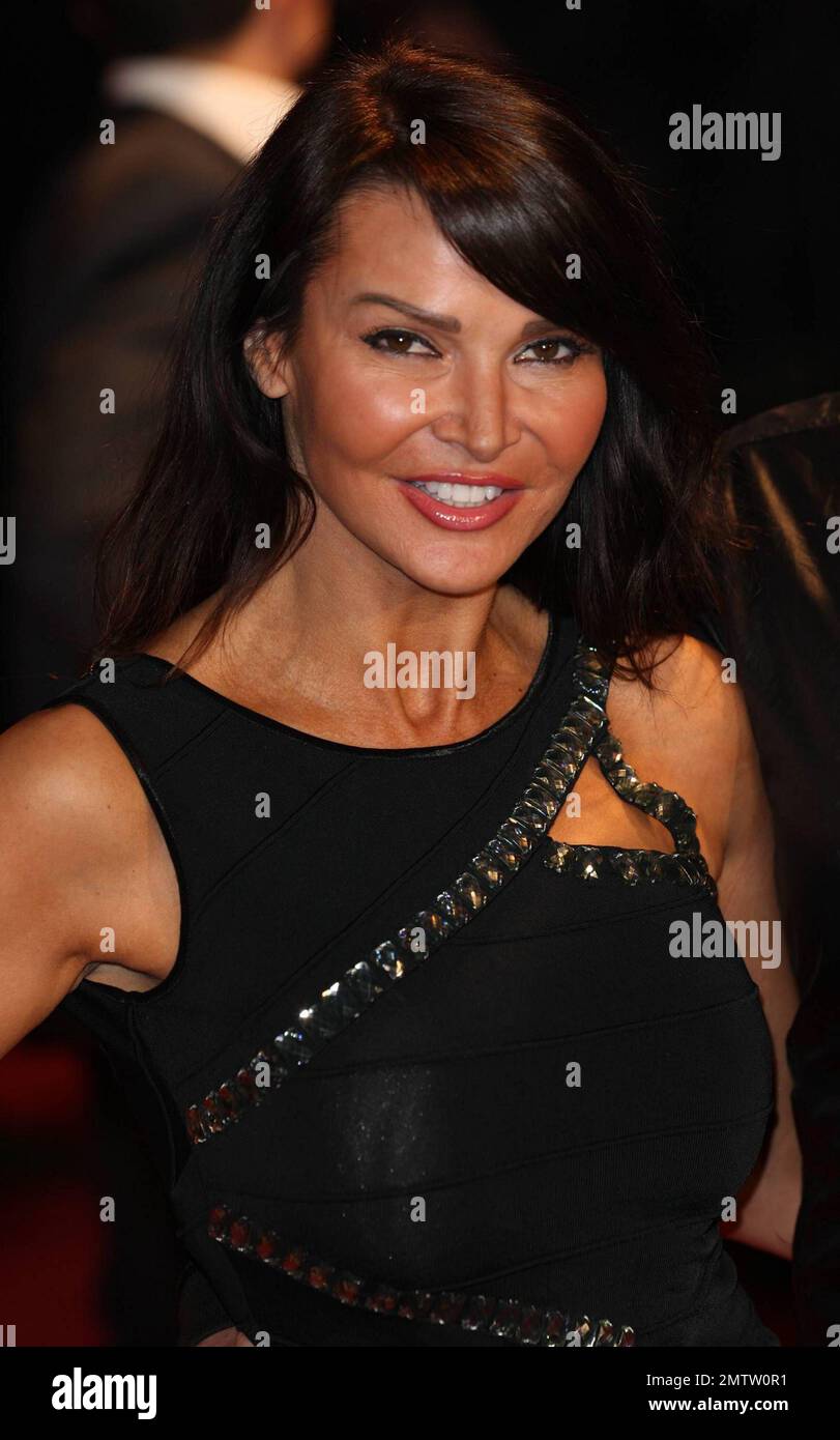 Lizzie Cundy poses for photographers on the red carpet at the UK ...