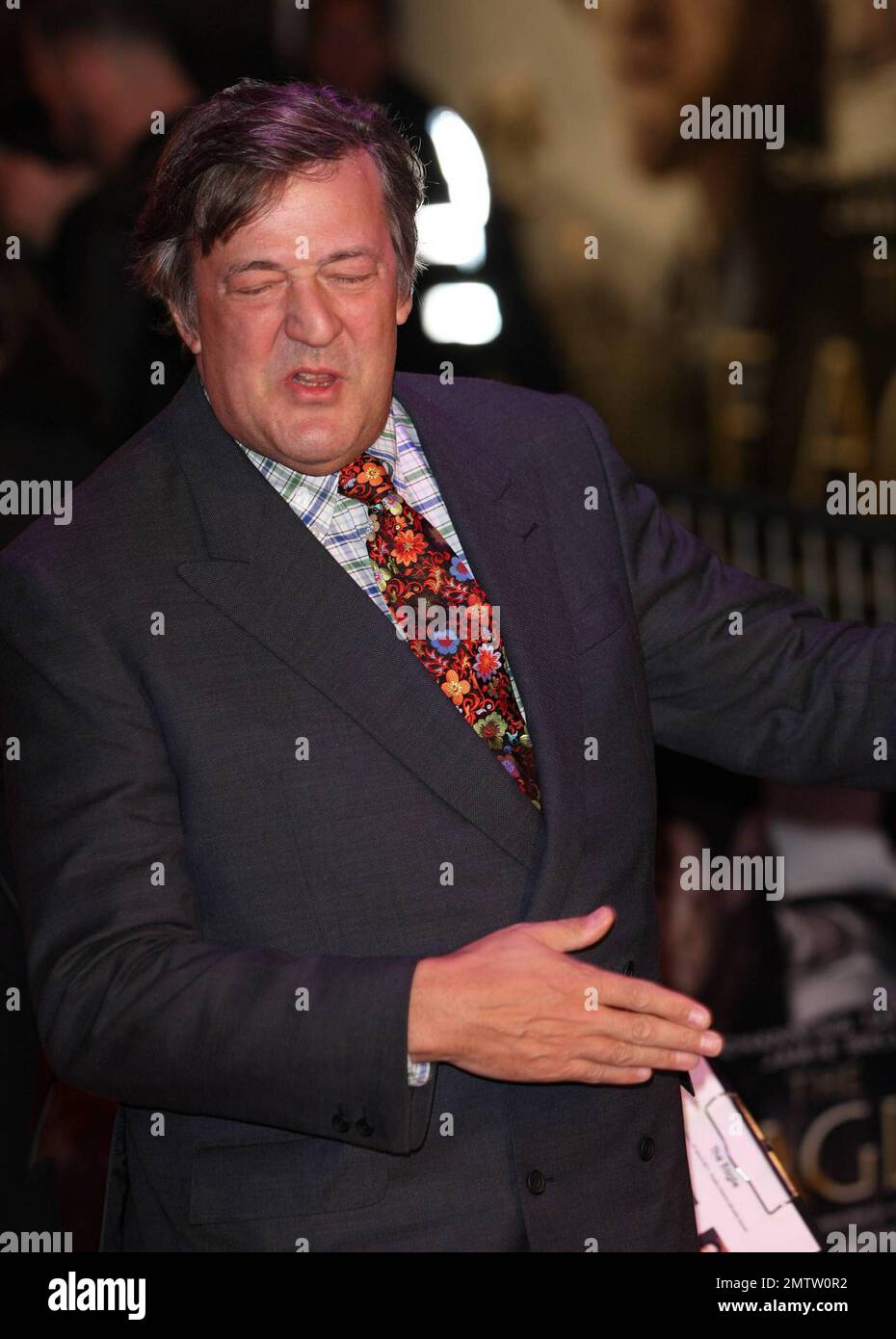 Stephen Fry poses for photographers on the red carpet at the UK ...