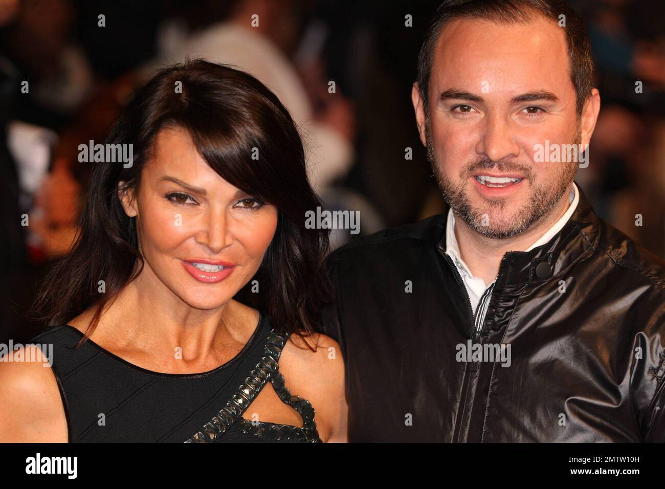 Lizzie Cundy and Nick Ede pose for photographers on the red carpet at ...