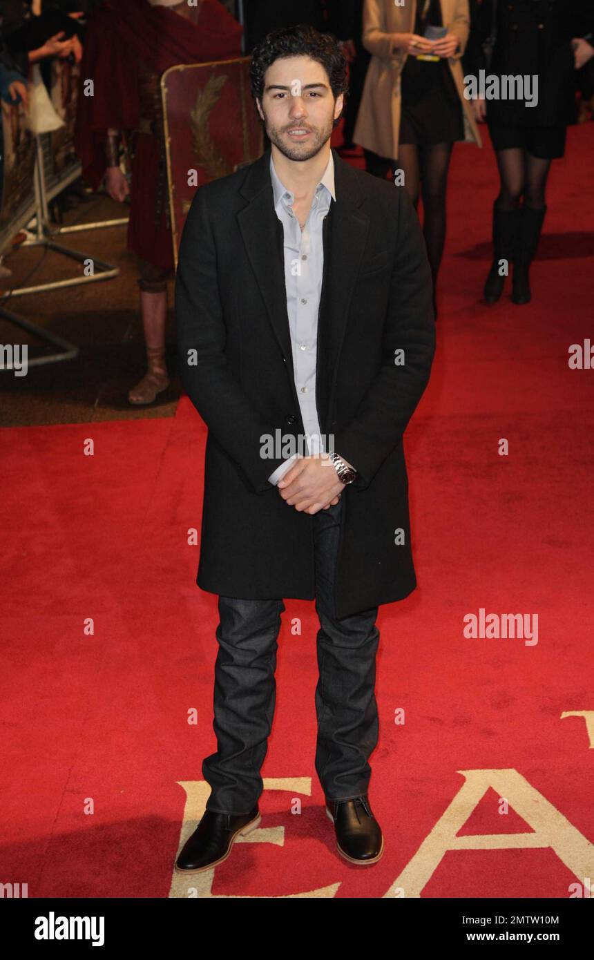 Tahar Rahim poses for photographers on the red carpet at the UK ...