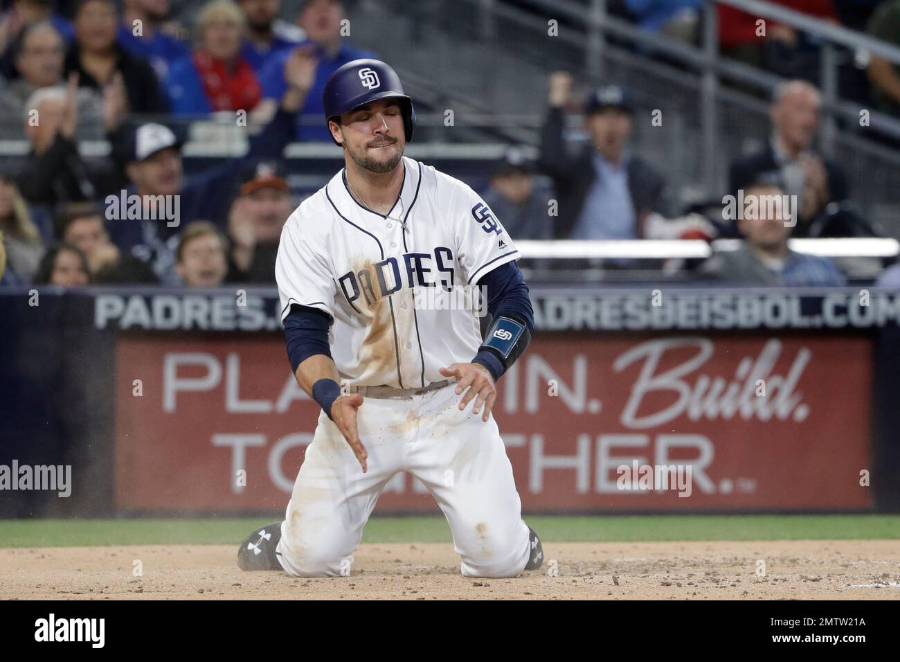 San Diego Padres' Austin Hedges, scores off an RBI single by Manuel ...