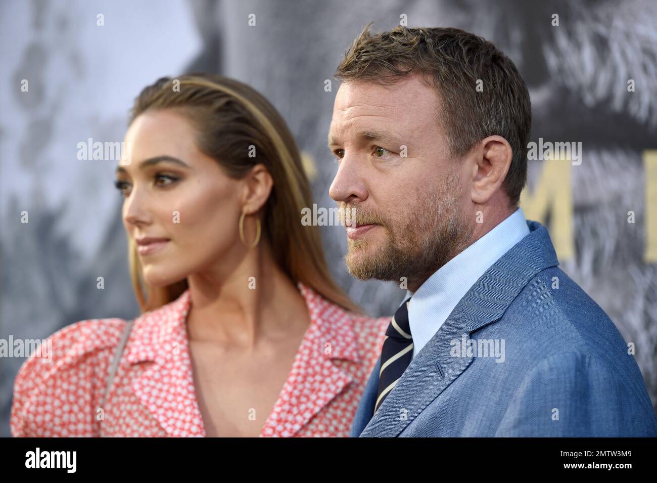 Jacqui Ainsley, left, and Guy Ritchie arrive at the world premiere of "King Arthur: Legend of ...