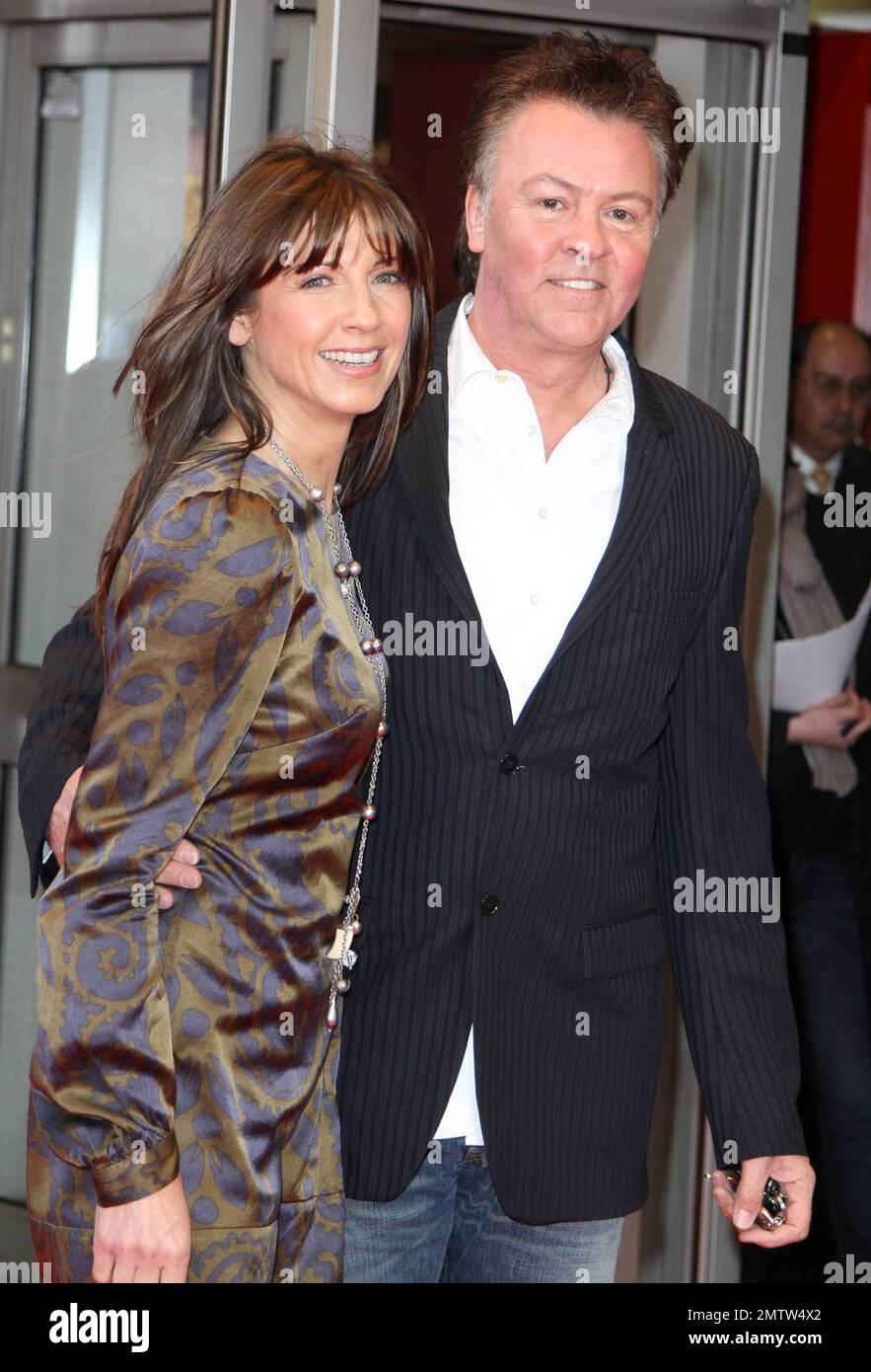 Singer Paul Young and partner Stacey Smith walk the red carpet at the world premiere of "The ...