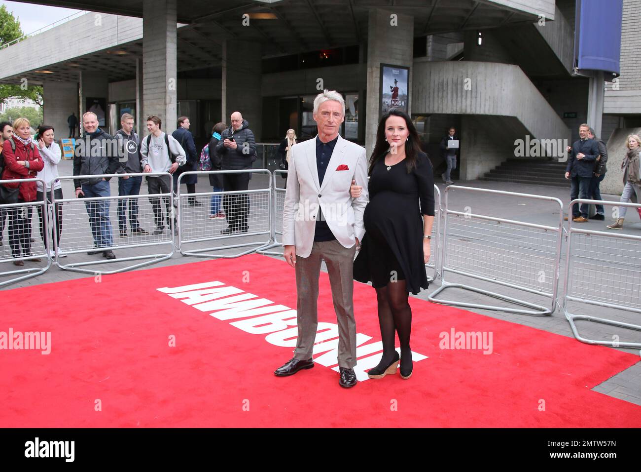 Singer Paul Weller and wife Hannah Andrews pose for photographers upon ...