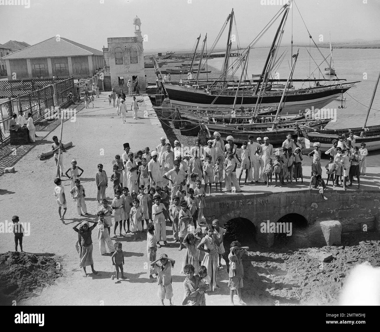 Quayside view of the piers in the Indian port city of Jafrabad ...