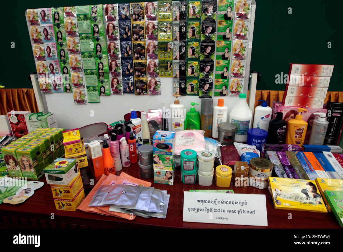 Counterfeit cosmetics are displayed during a press conference at ...