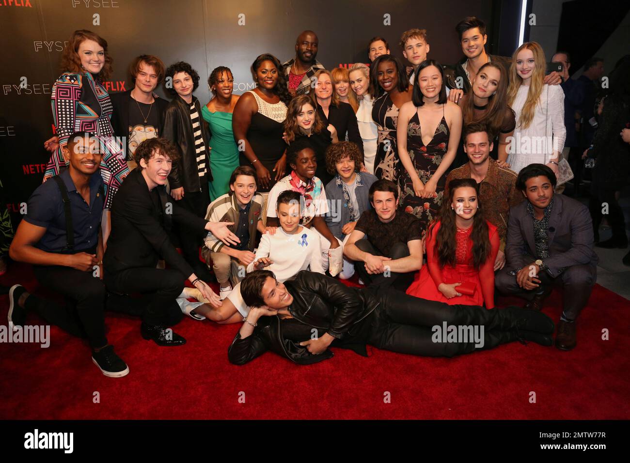 The casts of different shows of the network pose for a group photo at ...