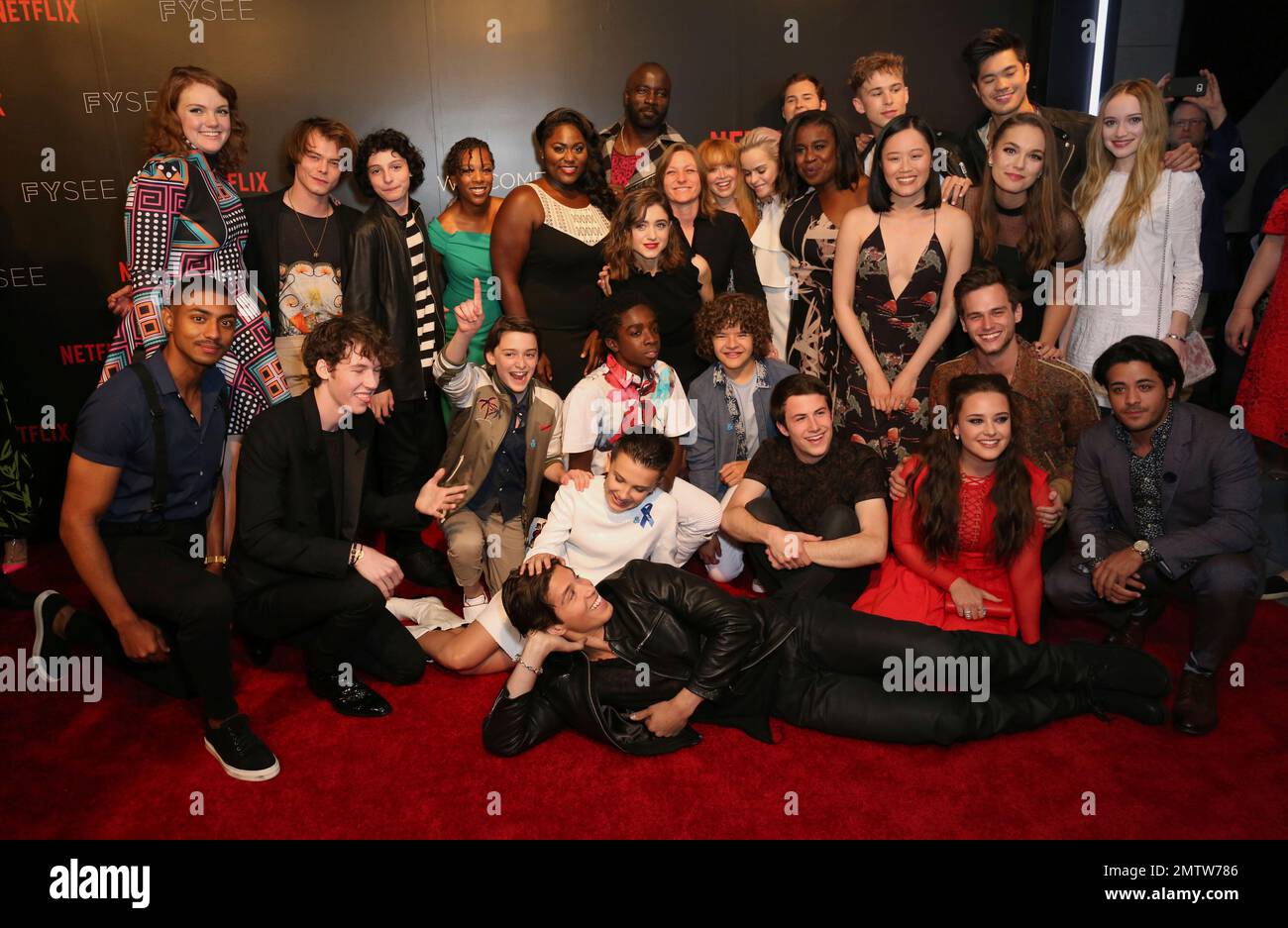 The casts of different shows of the network pose for a group photo at ...