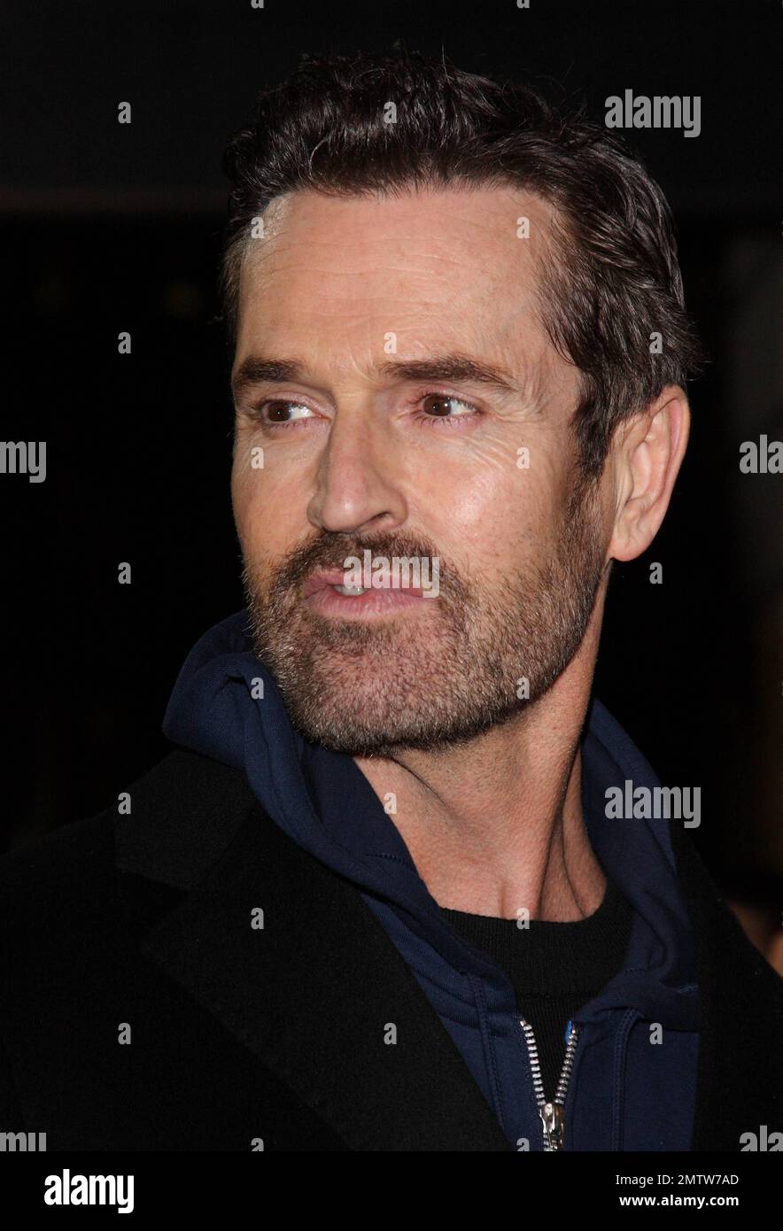 Rupert Everett walks the red carpet at Garrick Theatre during the ...