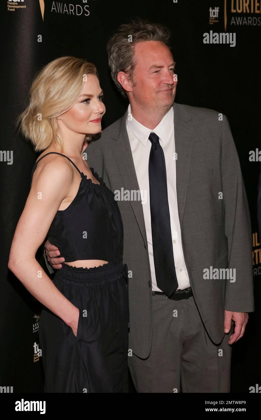 Actress Jennifer Morrison, left, and actor Matthew Perry attend the ...