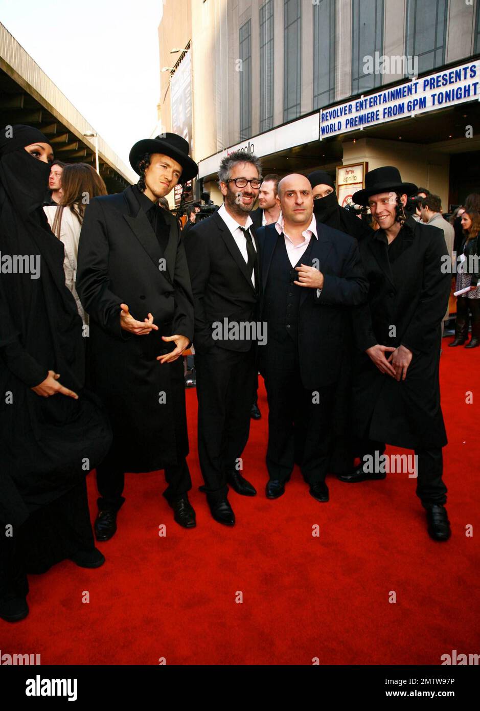 Writer David Baddiel and actor Omid Djalili pose on the red carpet with ...