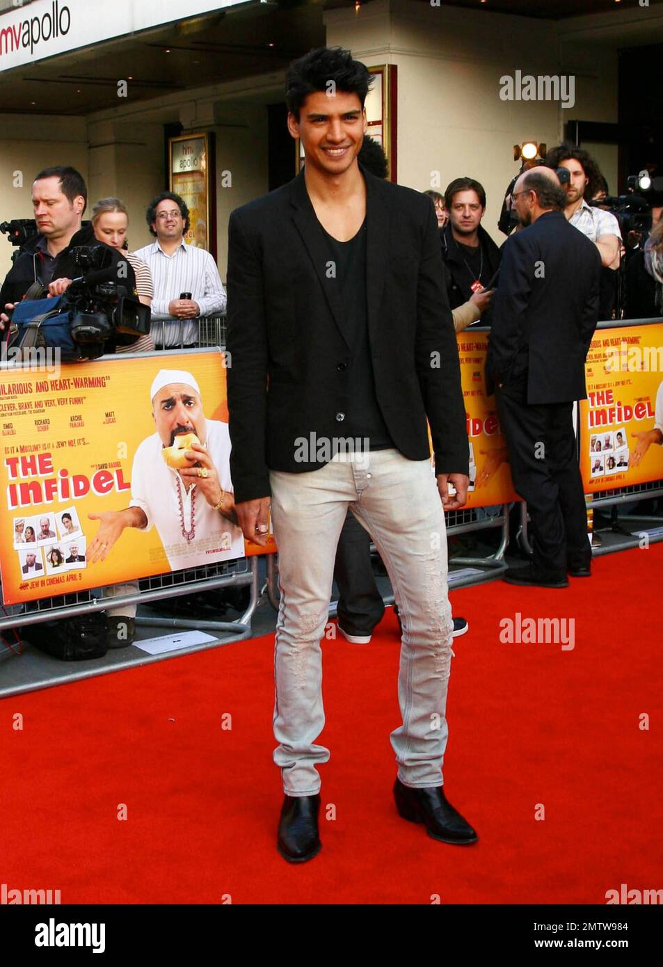 Guests walk the red carpet at the world premiere of "The Infidel" held ...