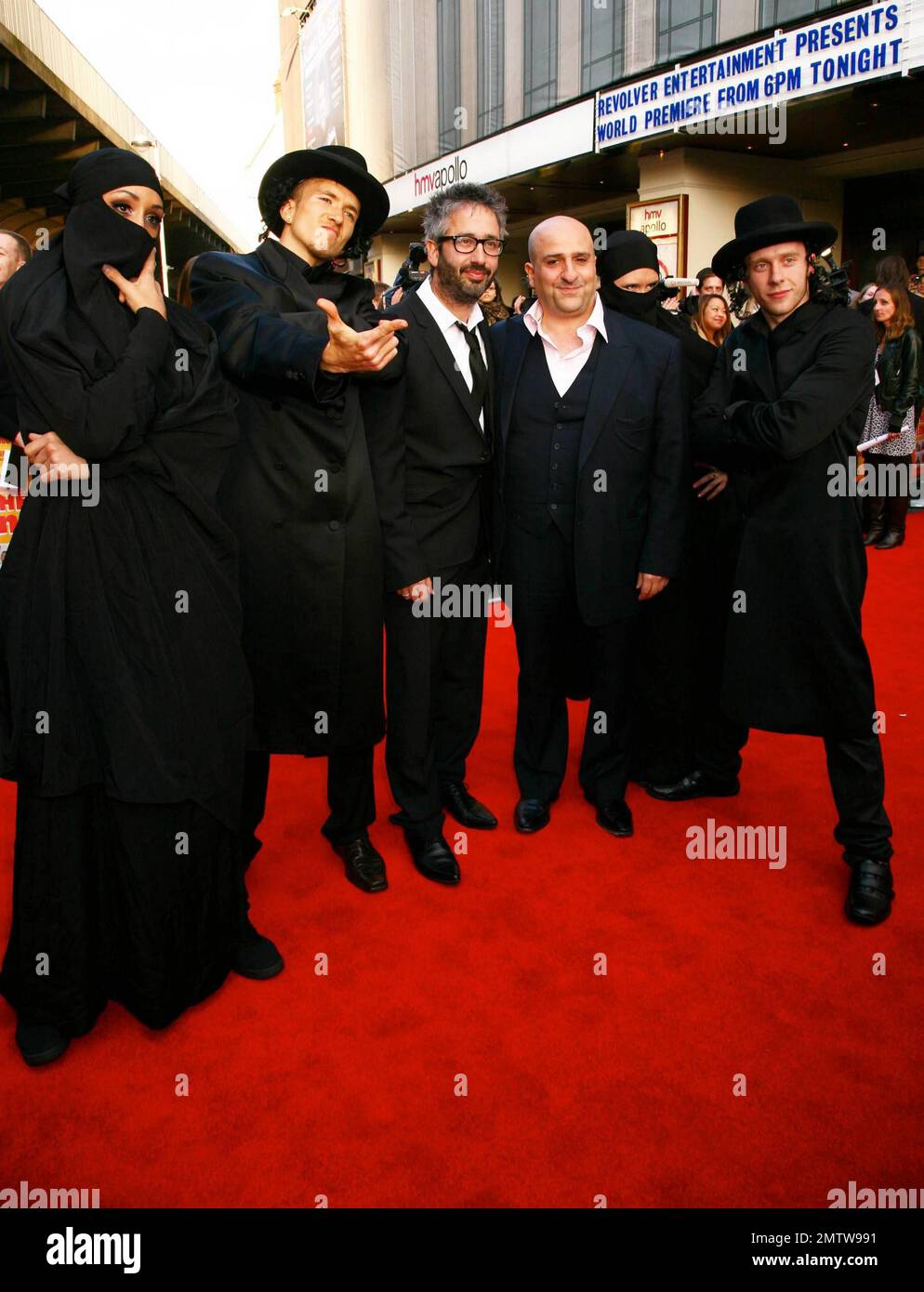 Writer David Baddiel and actor Omid Djalili pose on the red carpet with ...