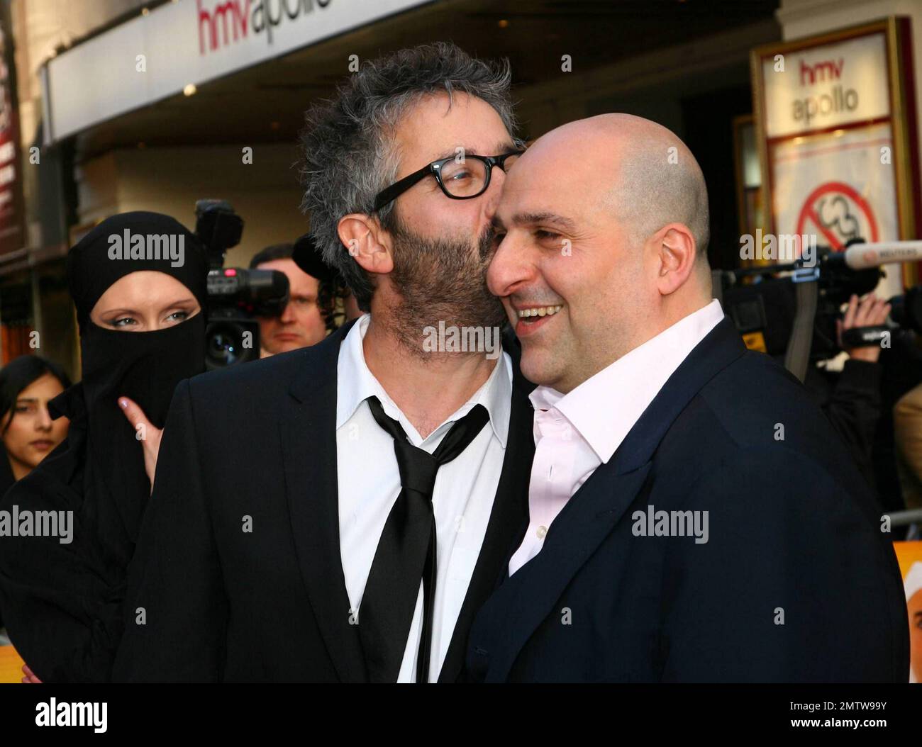 Writer David Baddiel and actor Omid Djalili goof around on the red ...
