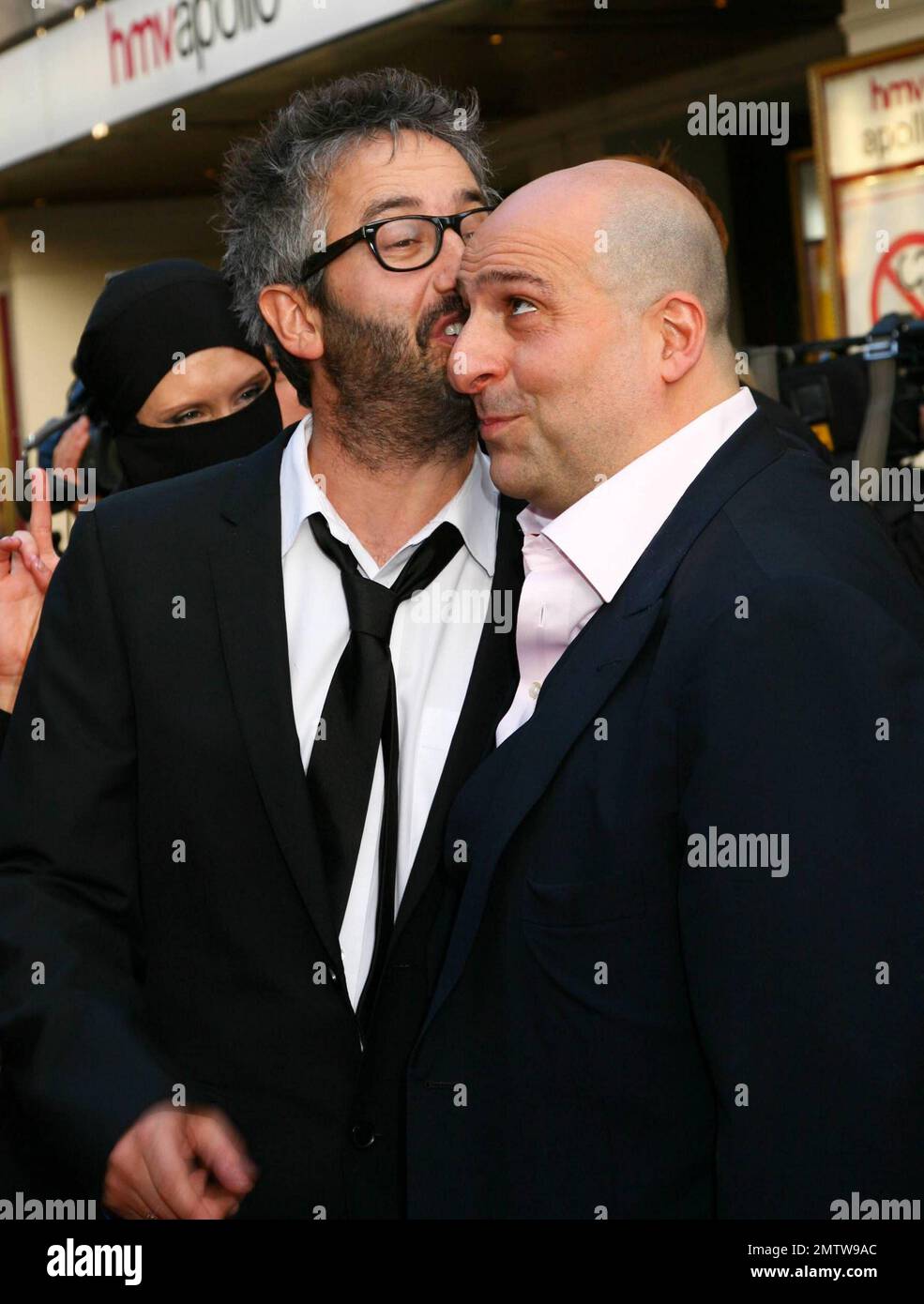 Writer David Baddiel and actor Omid Djalili goof around on the red ...