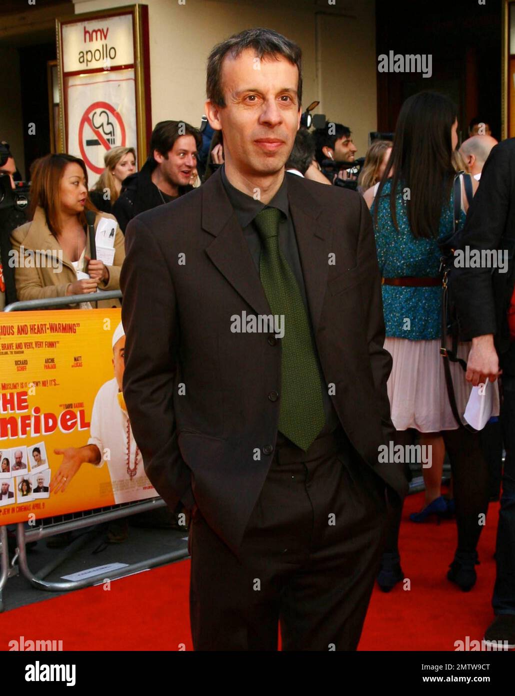 Actor David Schneider walks the red carpet at the world premiere of "The Infidel" held at the ...