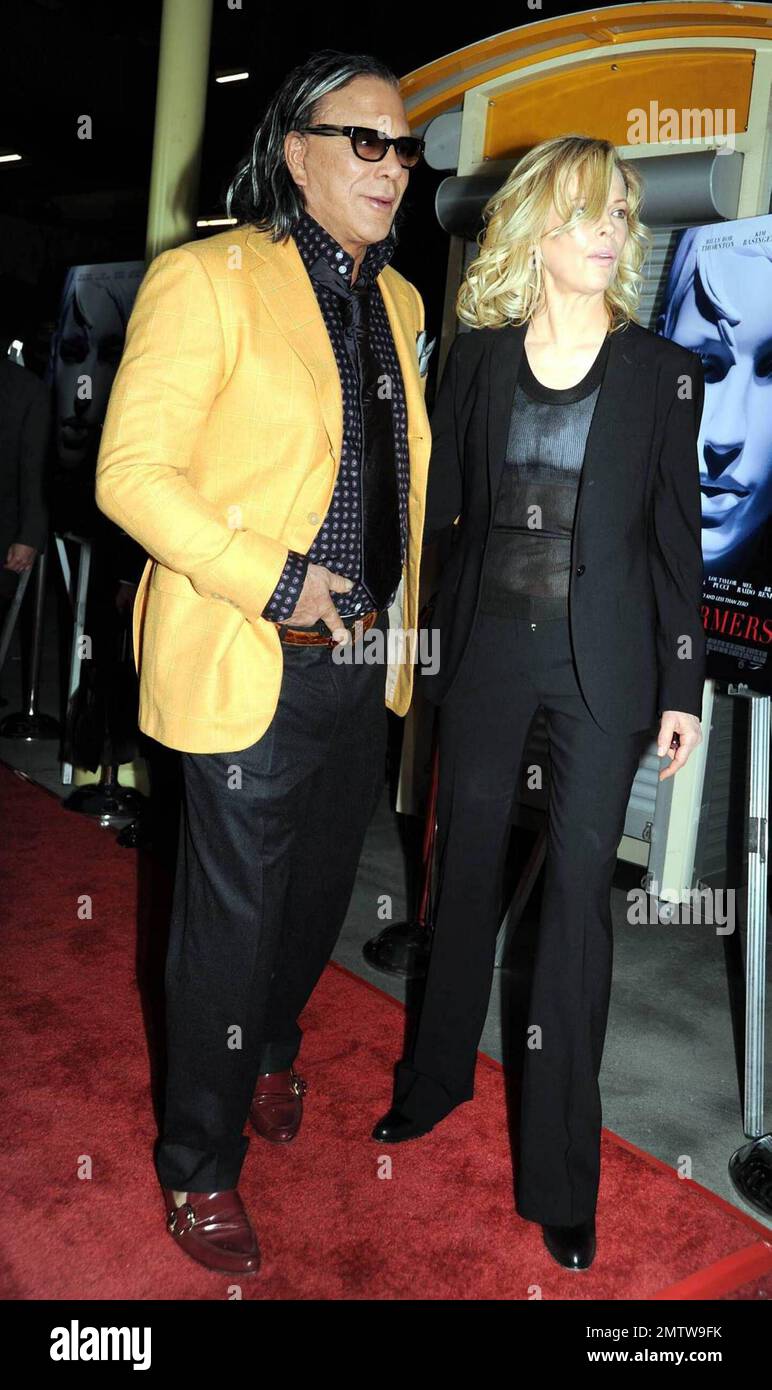 Mickey Rourke and Kim Basinger at "The Informers" premiere at the ...