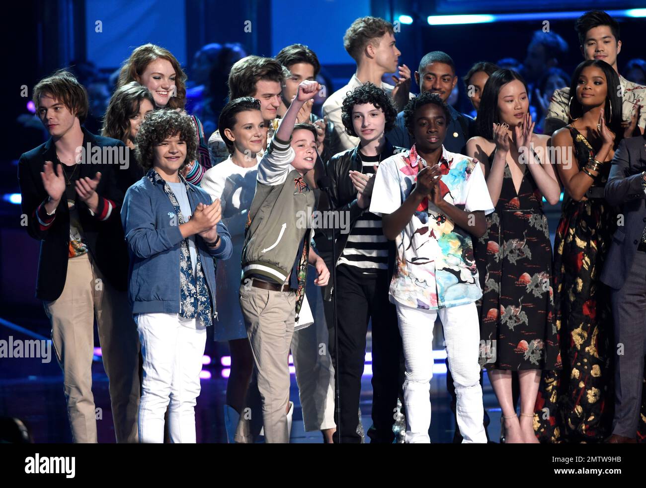 The cast of "Stranger Things" accept the award for show of the year at ...
