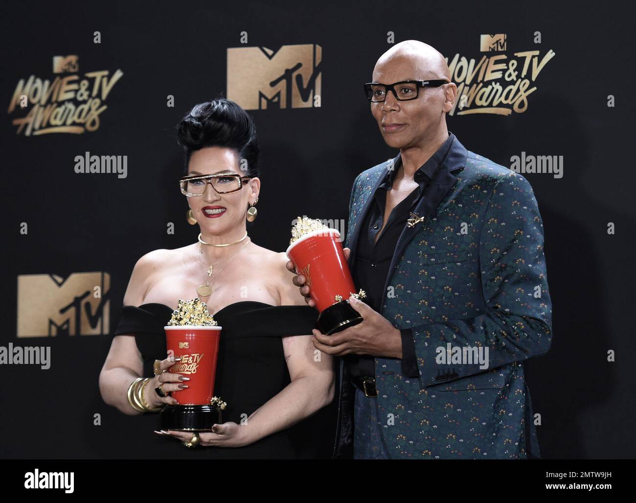 Michelle Visage, left, and RuPaul pose with the award for best reality ...