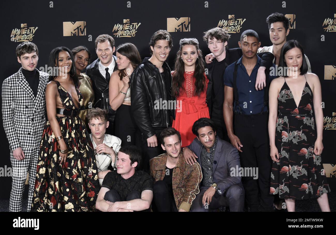 The cast of "13 Reasons Why" poses in the press room at the MTV Movie ...