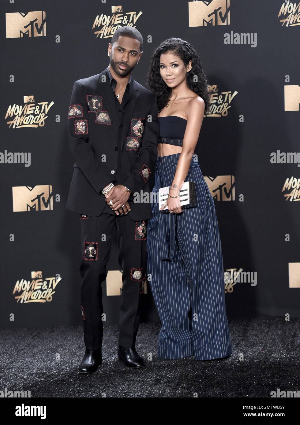 Big Sean, left, and Jhene Aiko arrive at the MTV Movie and TV Awards at the Shrine Auditorium on ...