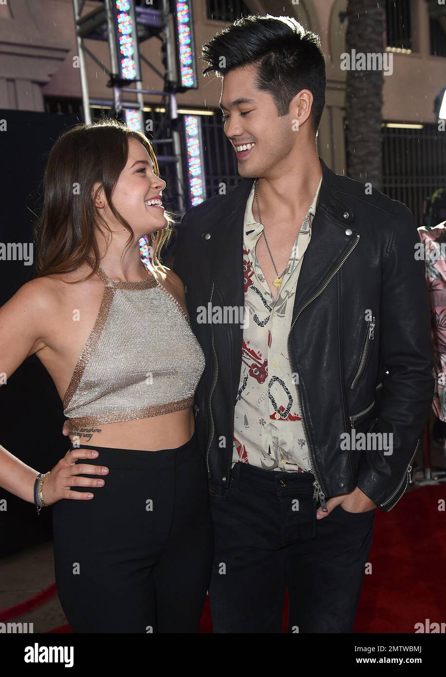 Sosie Bacon, left and Ross Butler arrive at the MTV Movie and TV Awards ...