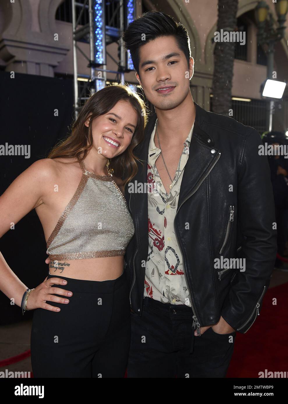 Sosie Bacon, left and Ross Butler arrive at the MTV Movie and TV Awards ...