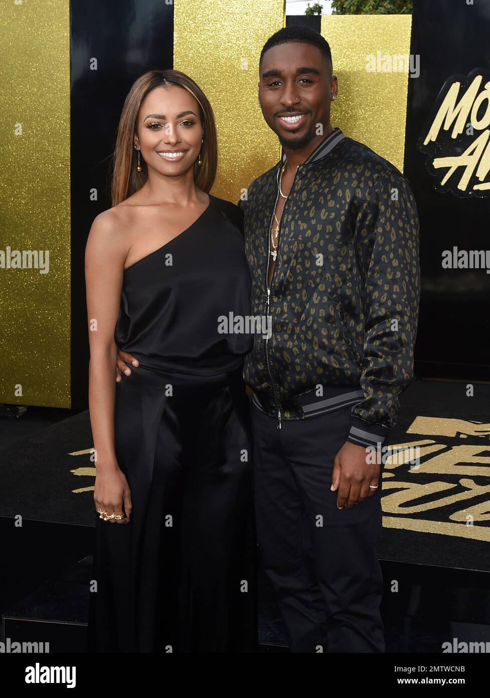Kat Graham, left, and Demetrius Shipp Jr. arrive at the MTV Movie and ...