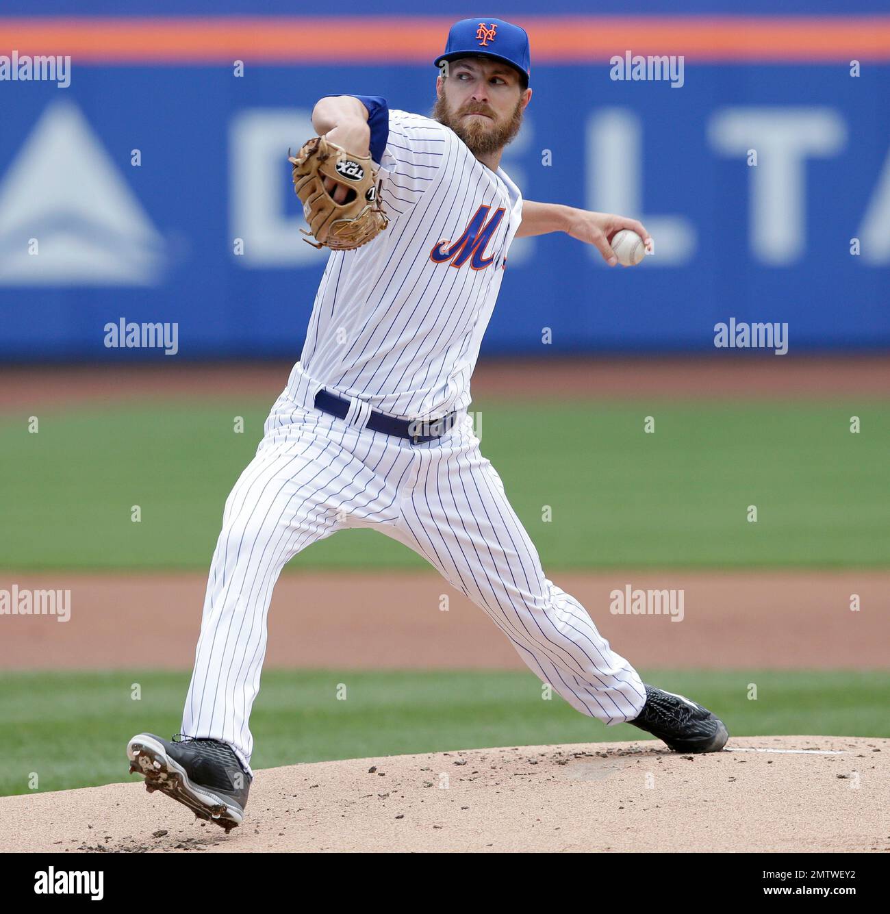 New York Mets starting pitcher Adam Wilk throws during the first inning ...