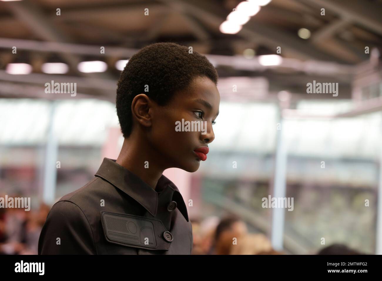 A model wears a creations part of the women's Prada Cruise mid season ...