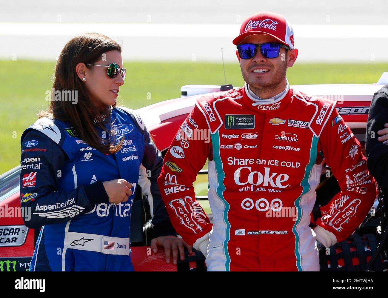 Danica Patrick talks with Kyle Larson during qualifying for the Camping ...