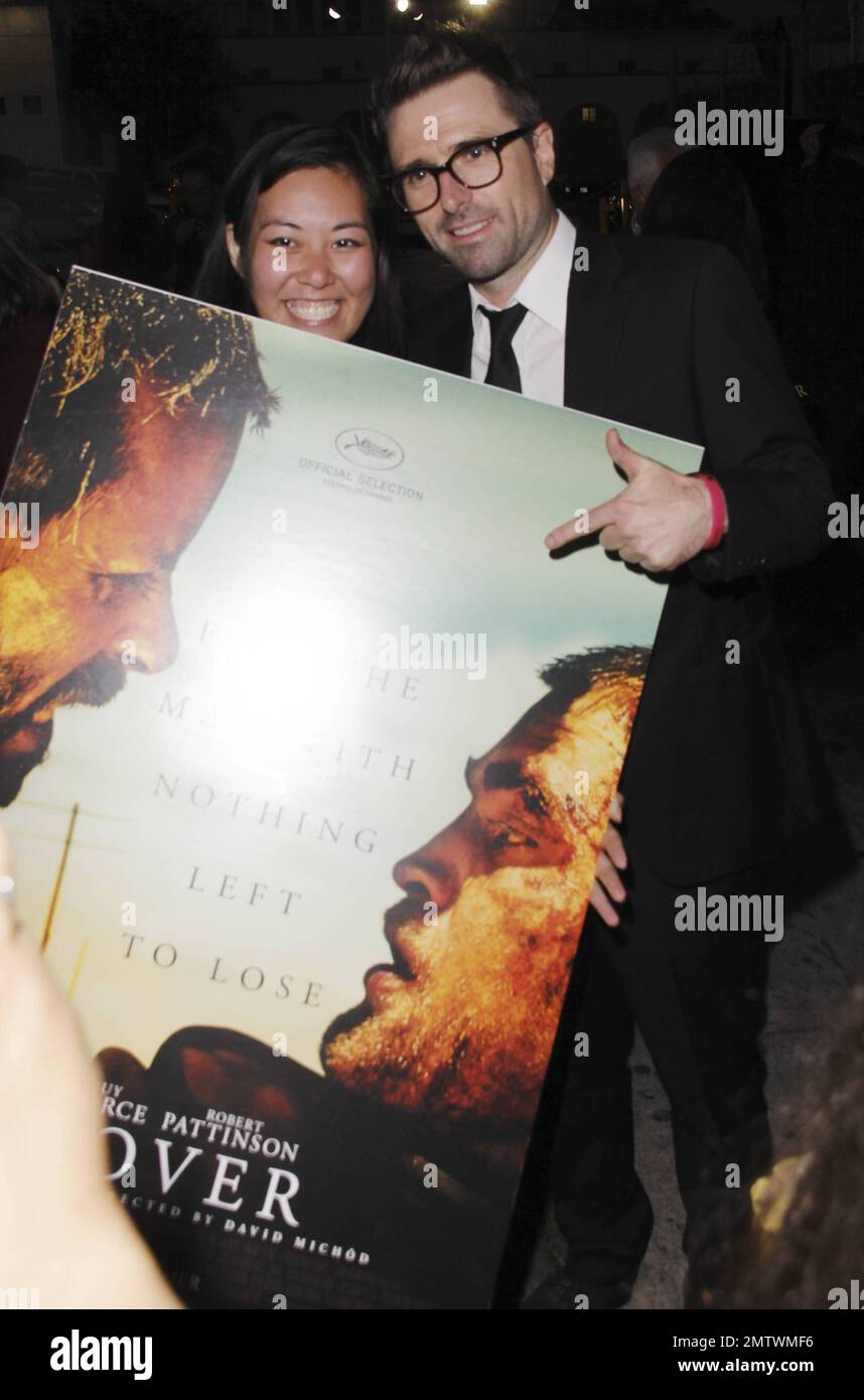 David Michod signs autographs at the premiere of The Rover at Regency ...