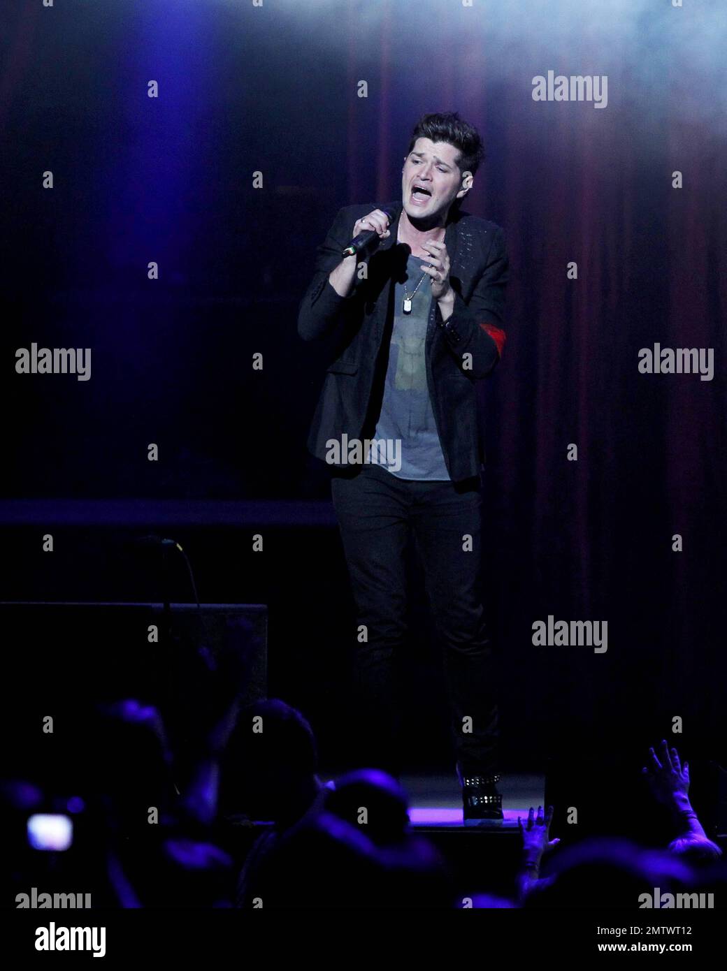 Danny O'Donoghue, lead vocalist of "The Script" performs with his ...