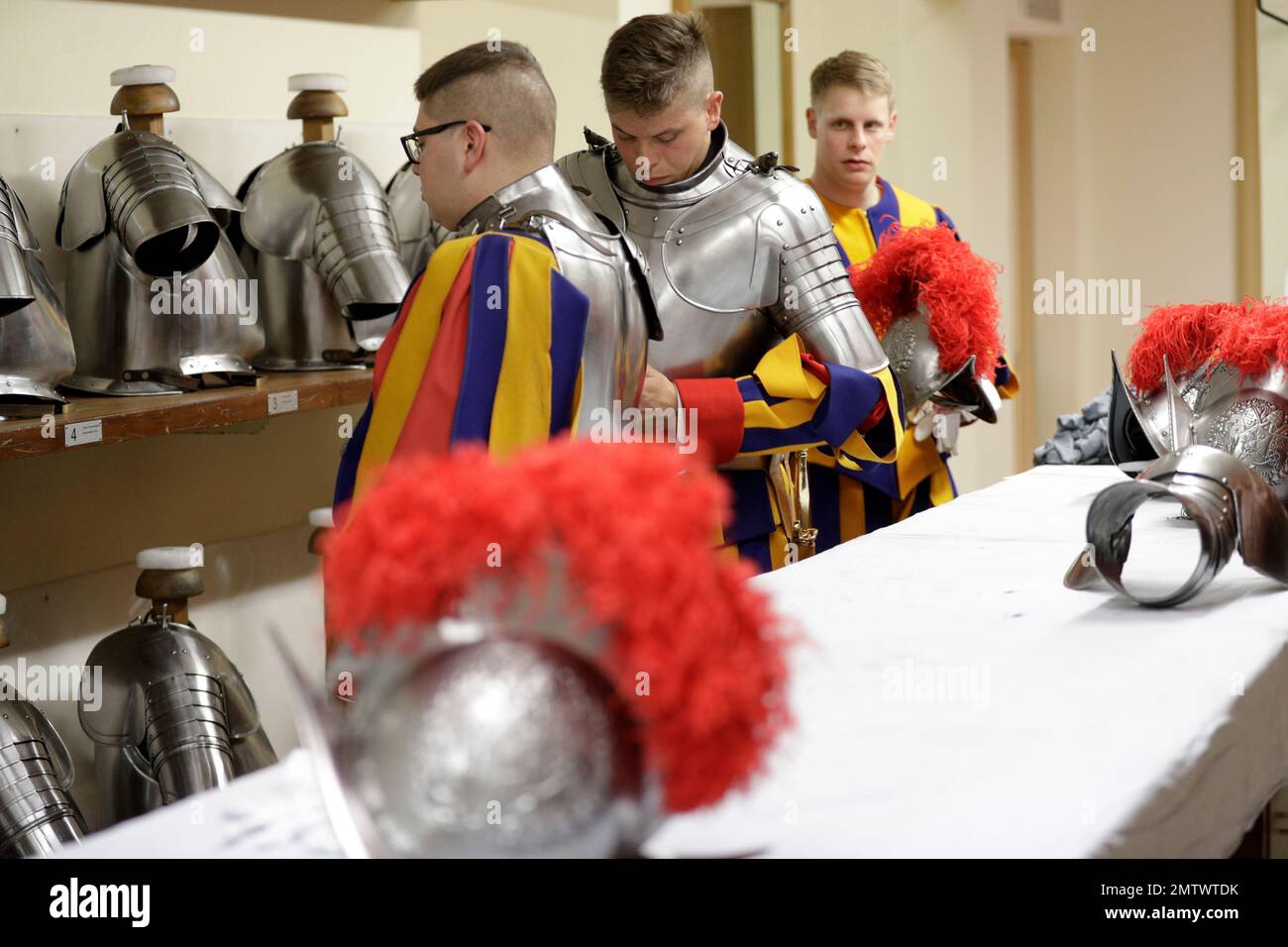 New Vatican Swiss Guards wear their uniforms and armors prior to a ...